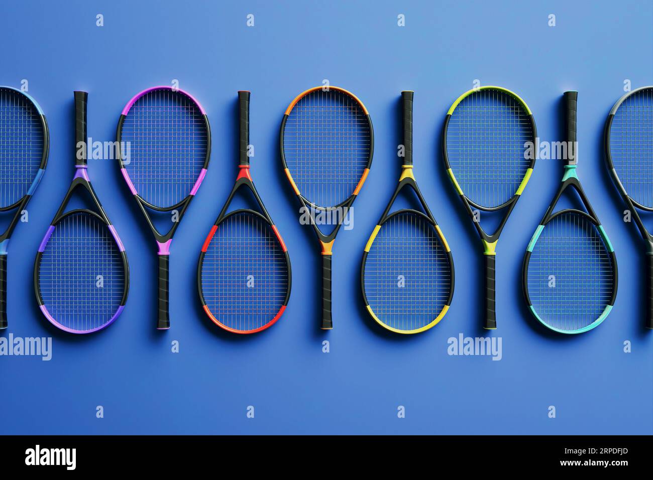 Professional tennis racquets in various colors. Blue background. Game ...