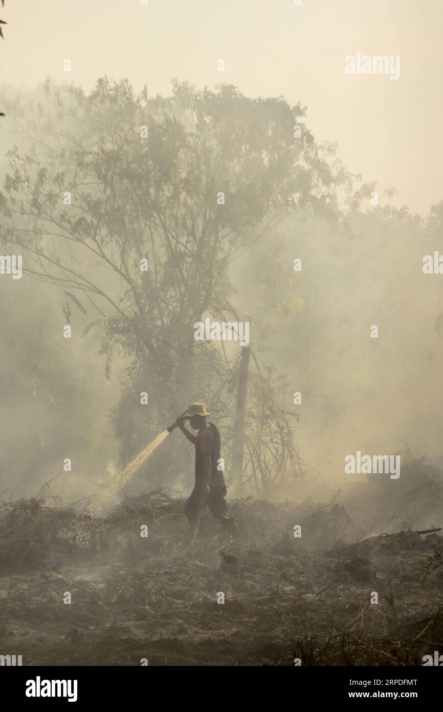 Indonesian firefighter hi-res stock photography and images - Alamy