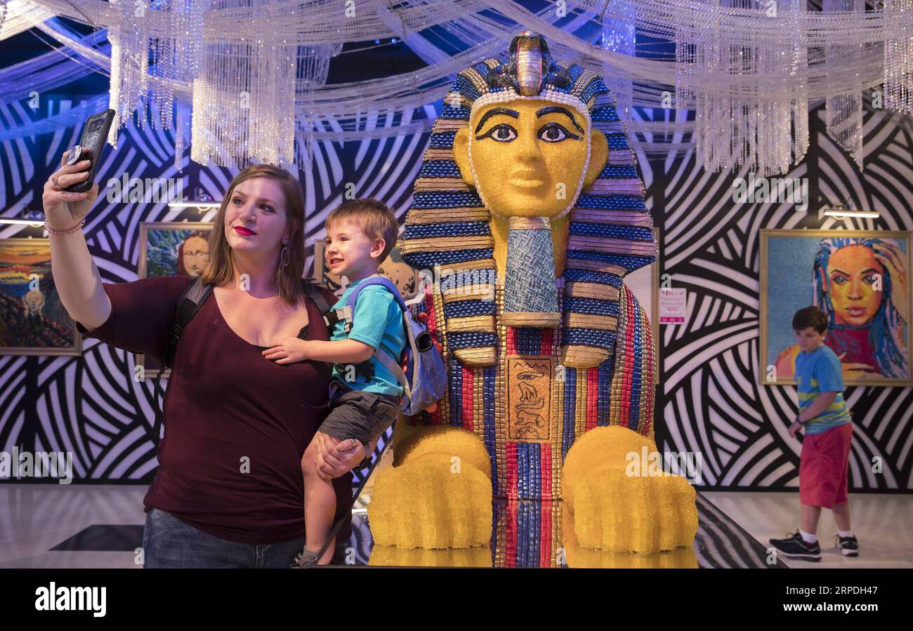 (190804) -- HOUSTON, Aug. 4, 2019 -- A woman takes a selfie with her ...