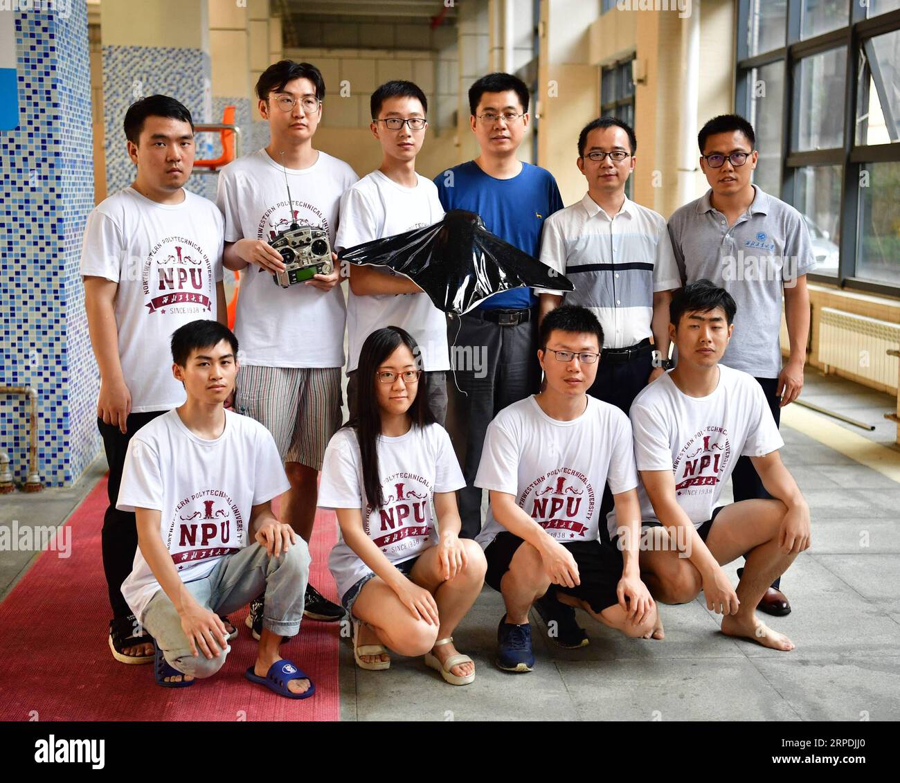 (190806) -- XI AN, Aug. 6, 2019 -- The research team takes a group ...