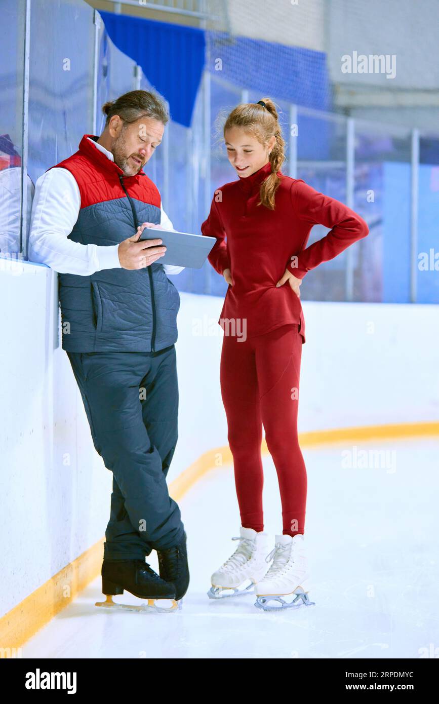 Child figure skating and coach hi-res stock photography and images - Alamy