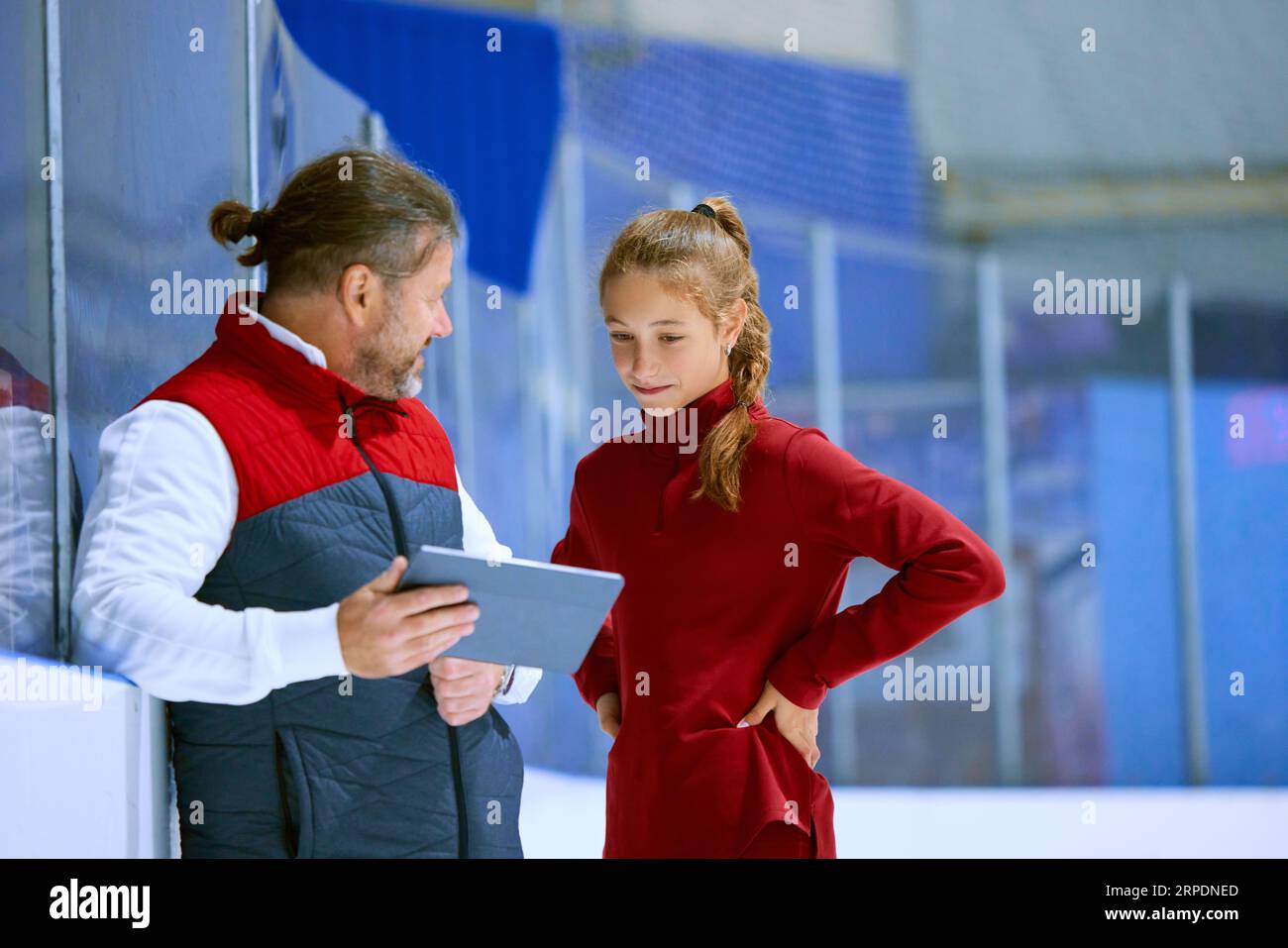 Child figure skating and coach hi-res stock photography and images - Alamy