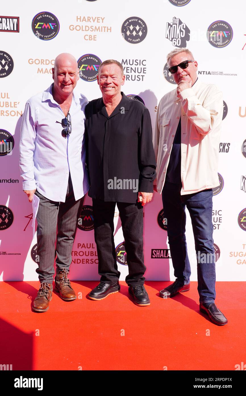 (left to right) Lee Bennett, Ali Campbell, and Suggs attend the Music ...