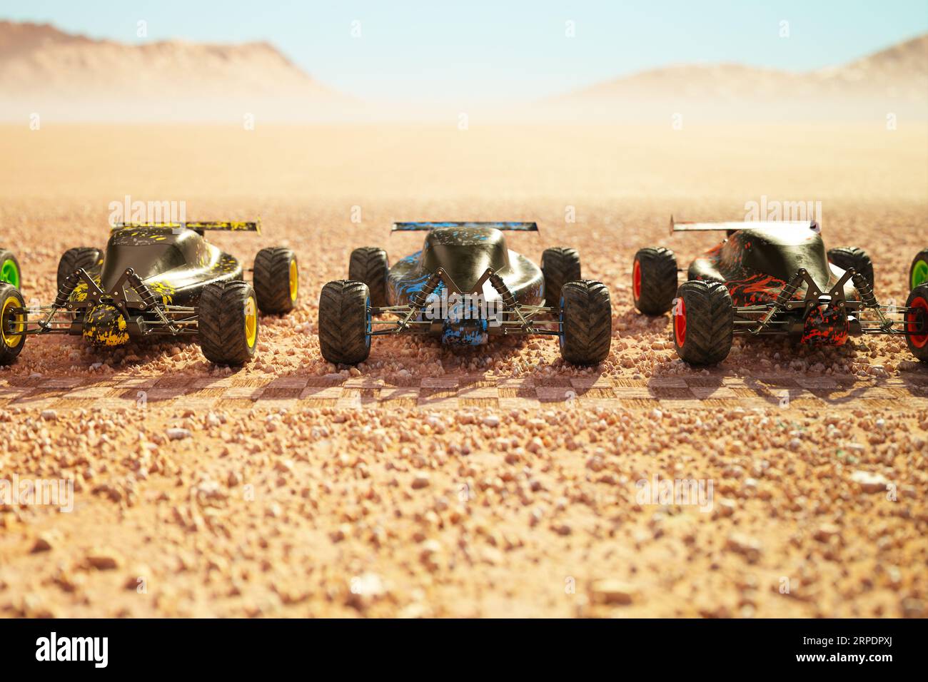 Multiple colourful remote-controlled buggy cars on start line in the ...