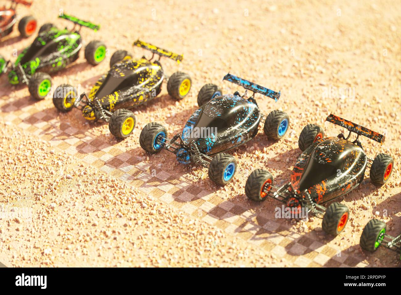 Multiple colourful remote-controlled buggy cars on start line in the ...