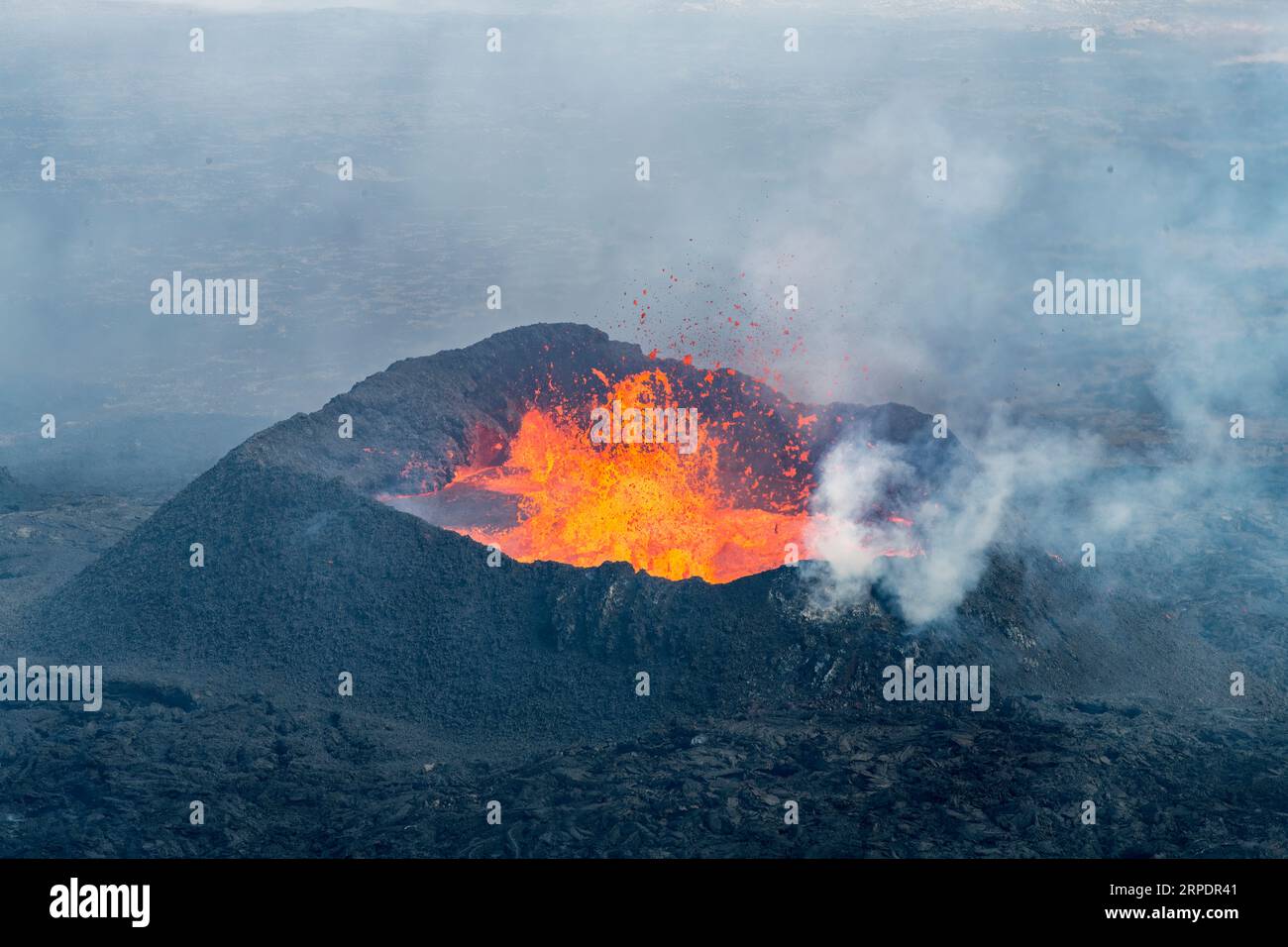 Close up view of spatter cone with lava of fissure near Litli-Hrútur ...