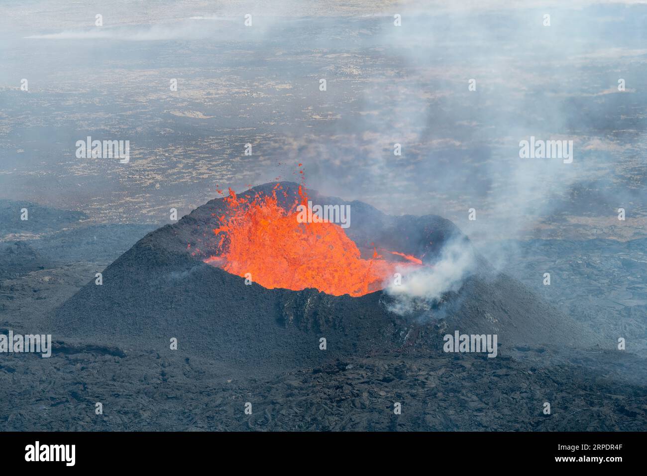 Close up view of spatter cone with lava of fissure near Litli-Hrútur ...