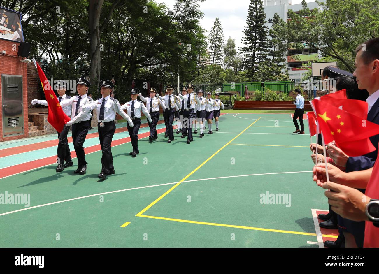 (190812) -- HONG KONG, Aug. 12, 2019 -- A flag raising team formed by ...