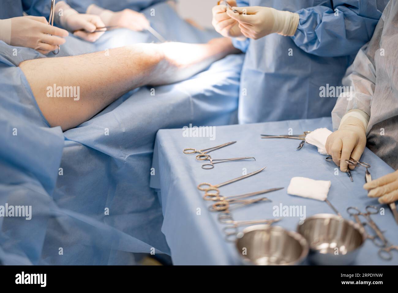 Surgery treatment in progress Stock Photo - Alamy