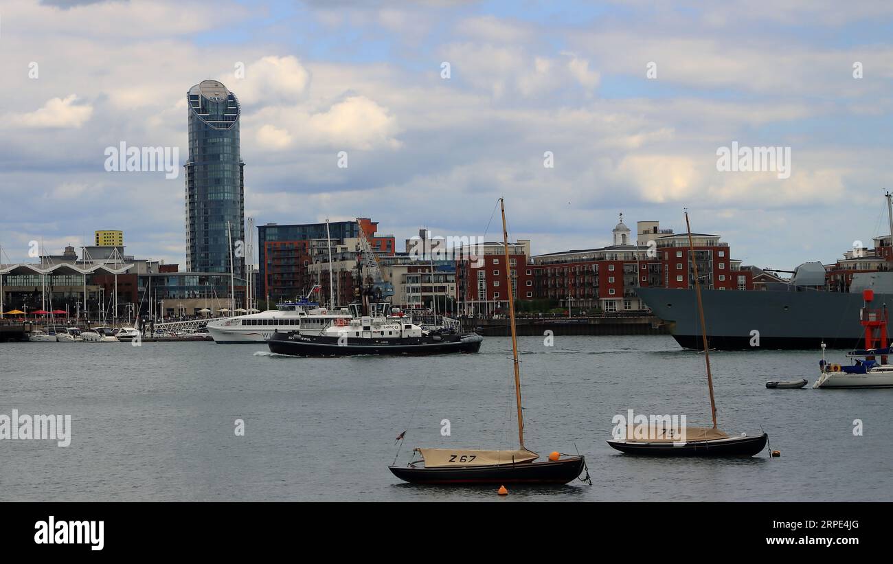 A tug leading the destroyer. D34, Royal Navy Type 45 daring class air ...