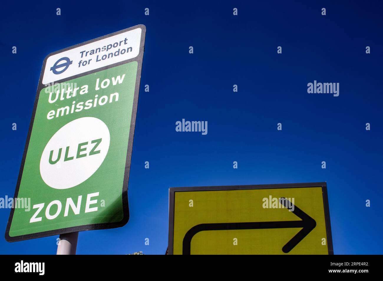 ULEZ zone sign with traffic in background in Wandsworth, London ...