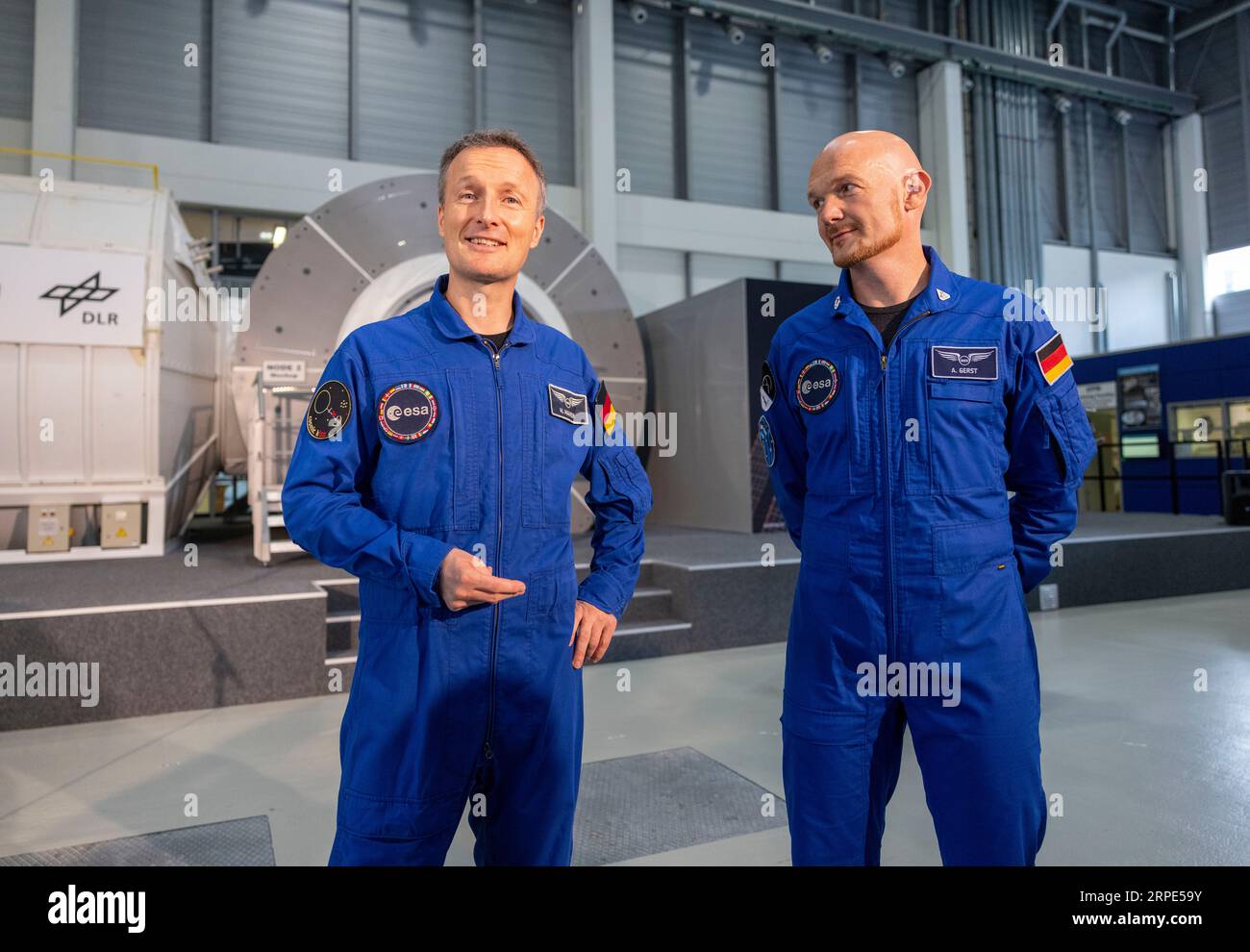 Cologne, Germany. 01st Sep, 2023. ESA astronauts Matthias Maurer (l-r) and Alexander Gerst stand ...