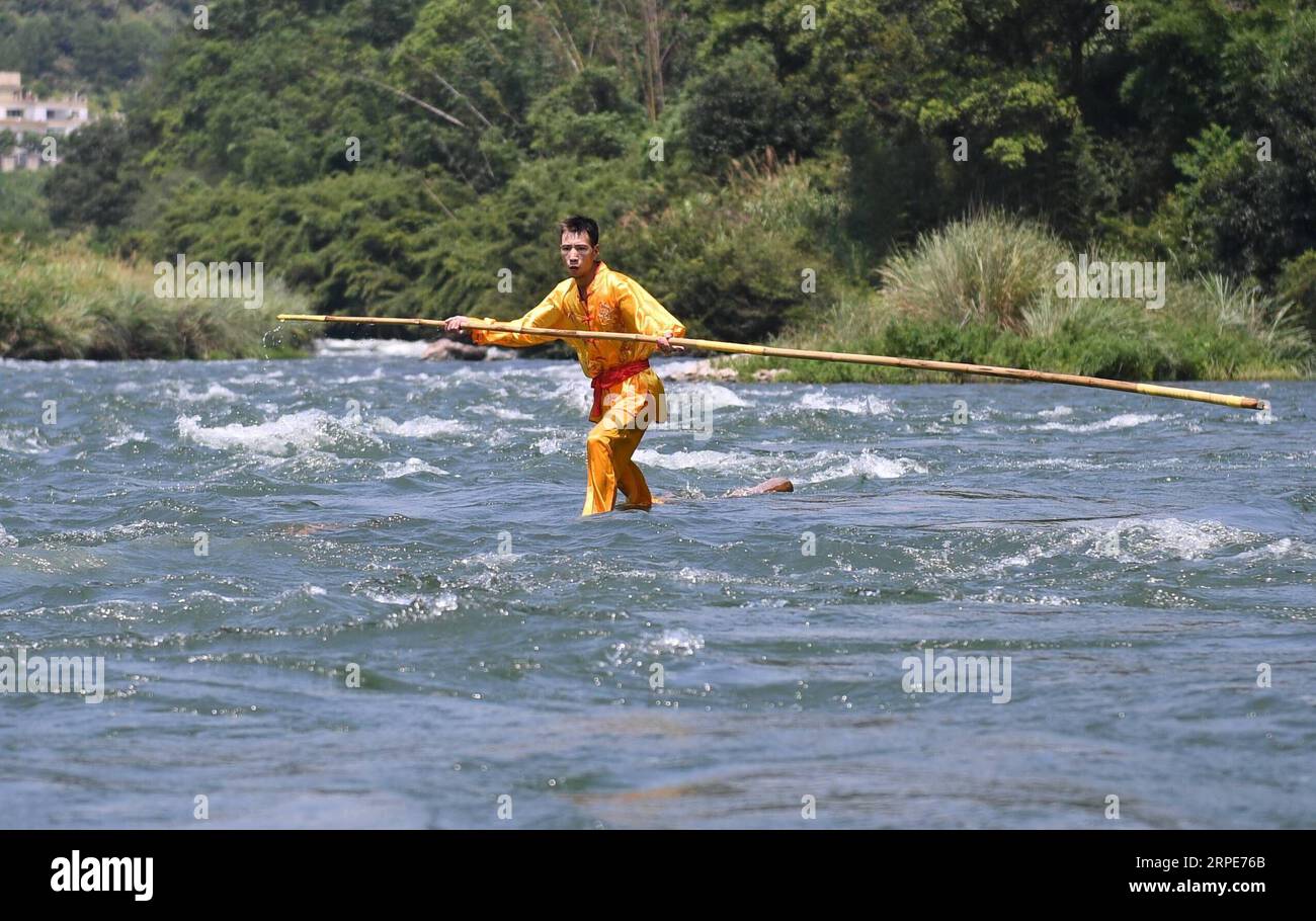 (190820) -- BEIJING, Aug. 20, 2019 -- Xie Ziben, a villager from Juzhou Village, performs single ...