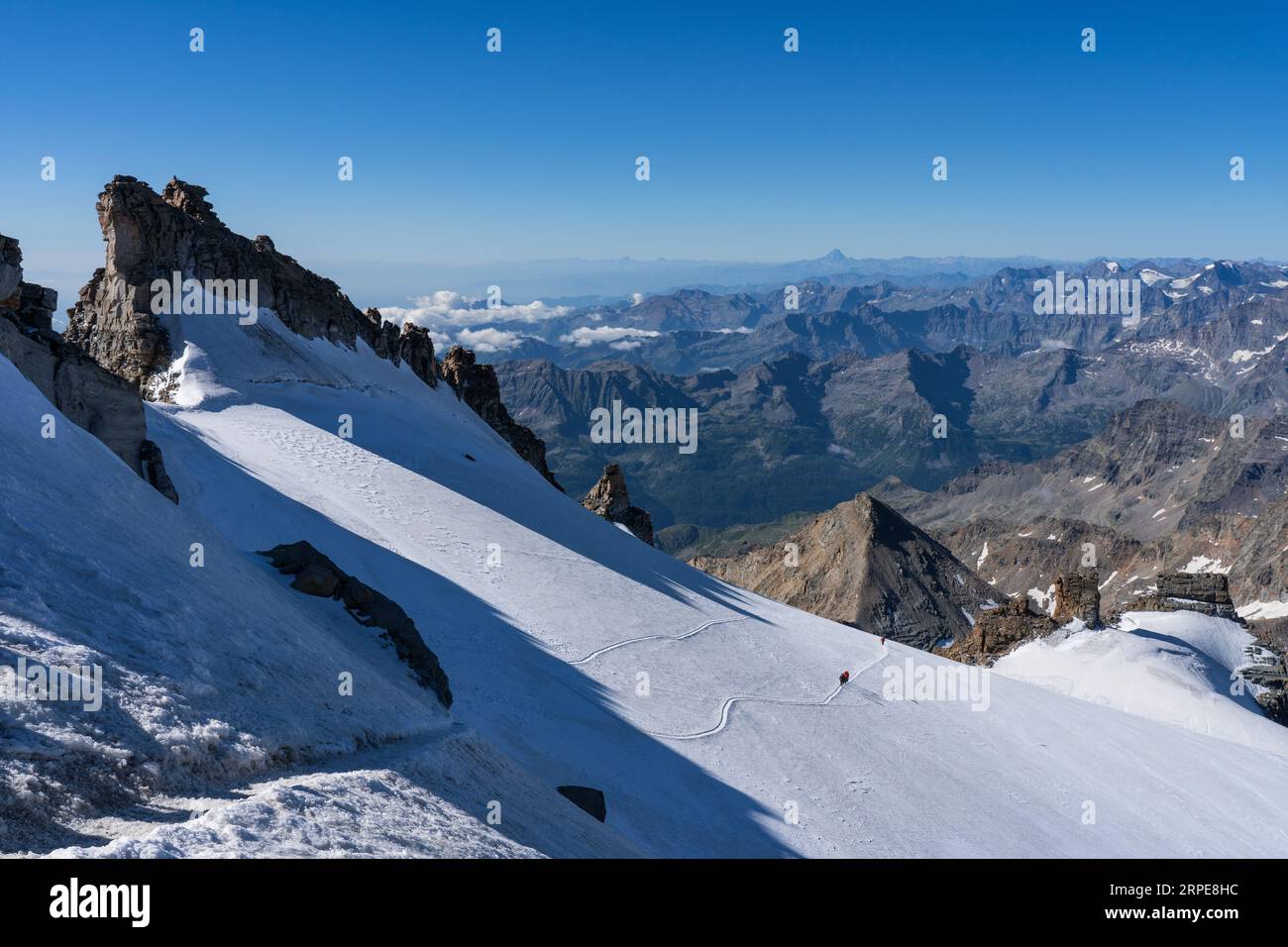 Mountaineers climbing Gran Paradiso glacier to the summit of the ...