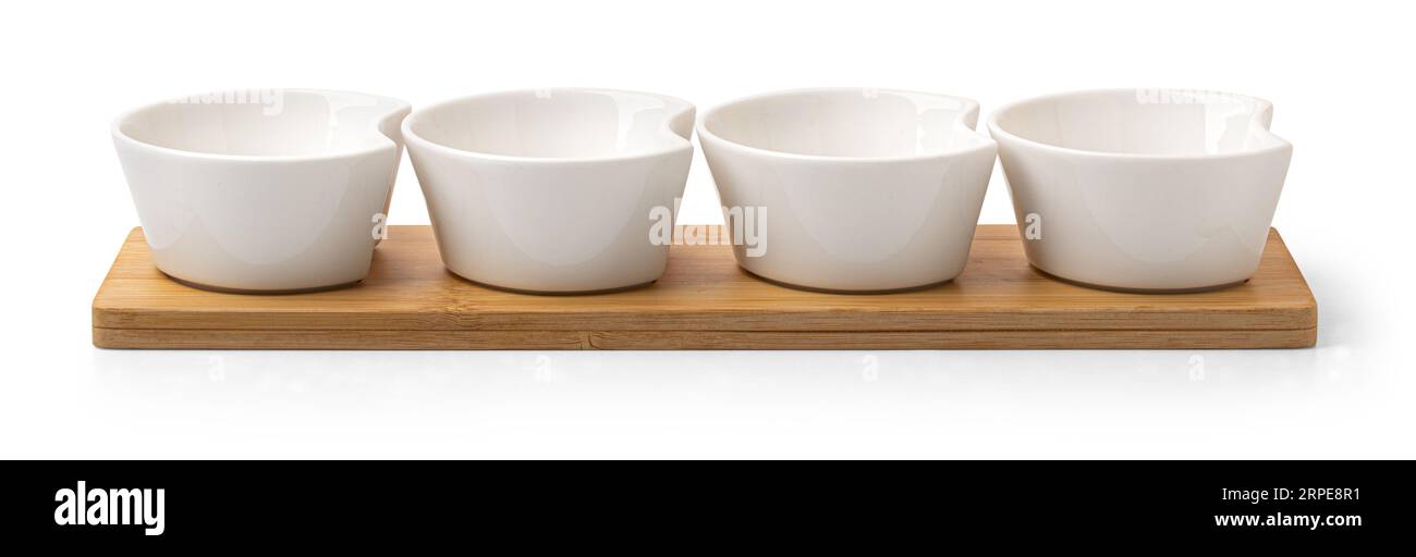 A set of white ceramic tableware on white background. Various types of ...