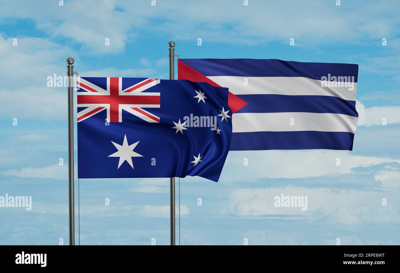 Cuba and Australia flag waving together in the wind on blue sky, two ...