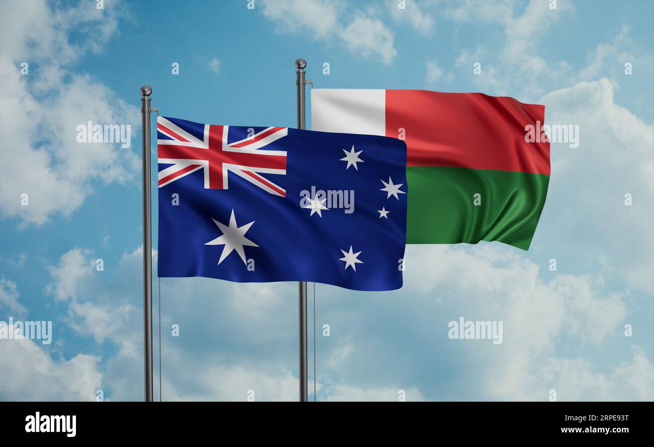 Madagascar flag and Australia flag waving together on blue sky, two ...