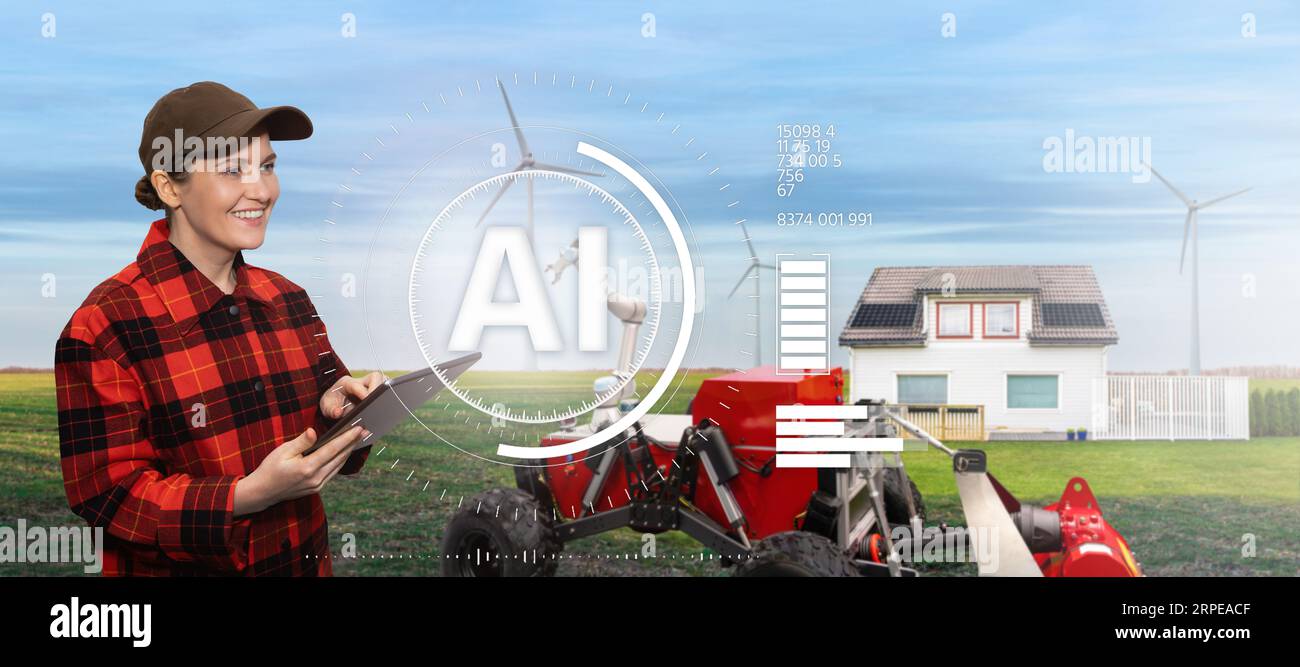 Woman farmer holds the computer in her hand and controls of autonomous ...