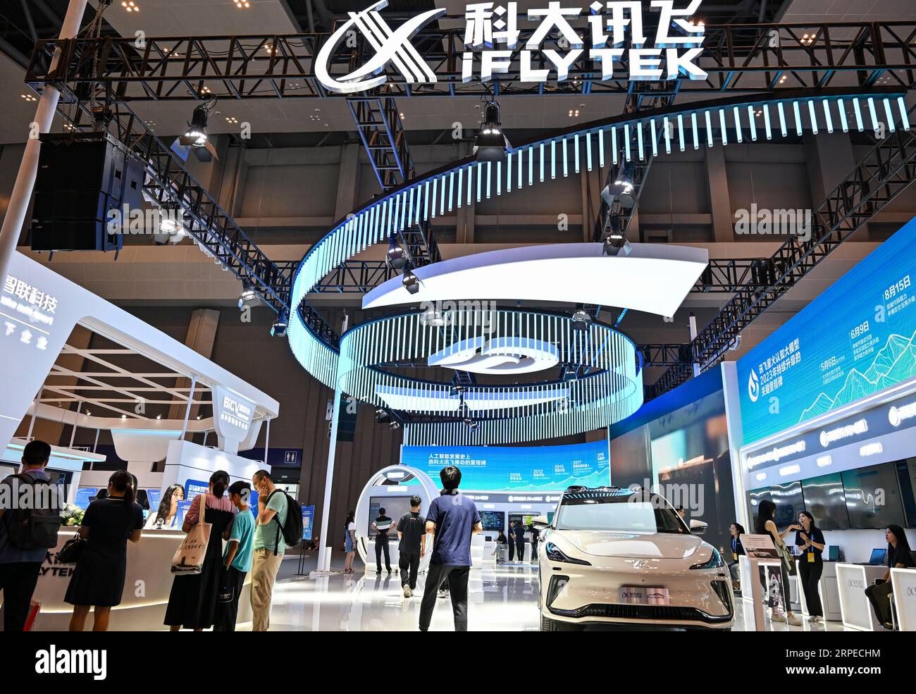 Chongqing. 4th Sep, 2023. Visitors are seen at the booth of iFLYTEK ...