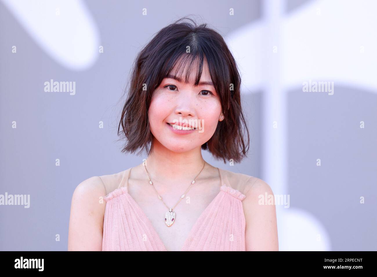 Ayaka Shibutani poses for photographers upon arrival for the premiere of the film 'Evil Does Not ...