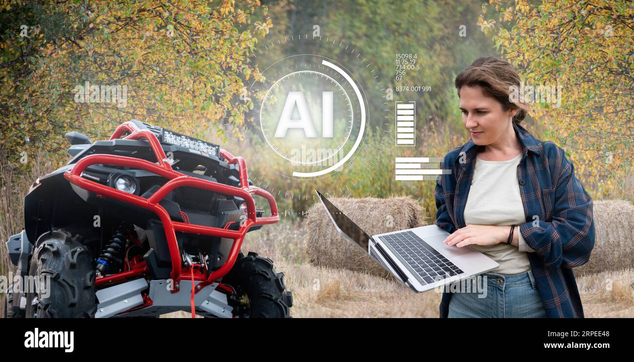 Woman farmer holds the computer in her hand and controls of autonomous ...