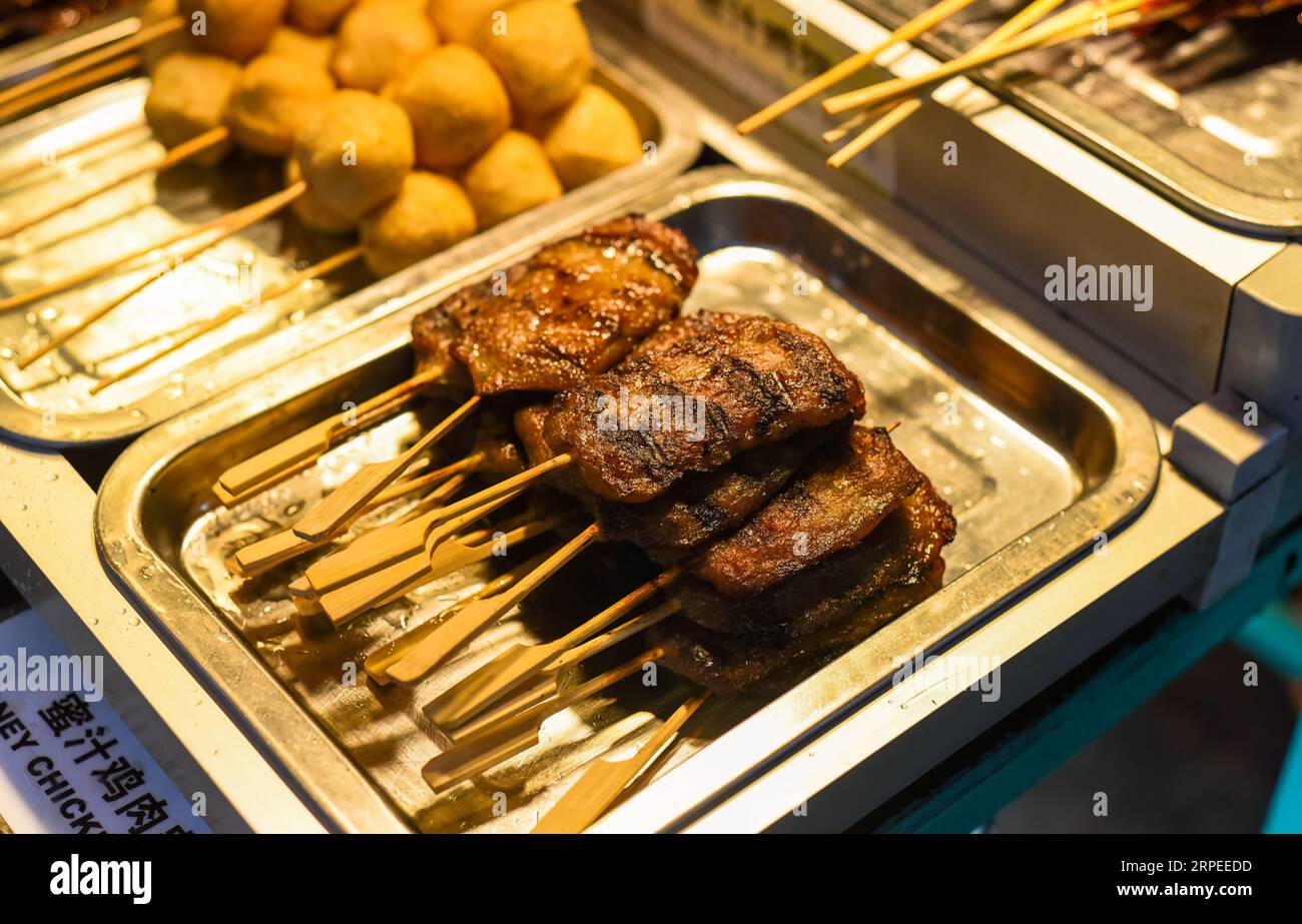 Grilled beef meat bbq in Jalan Alor street food in Kuala Lumpur Stock ...