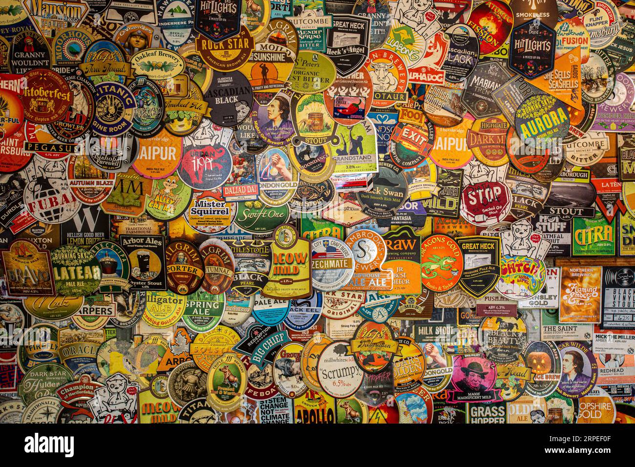 A collection of traditional, colorful real ale pump clips (hand-pump ...