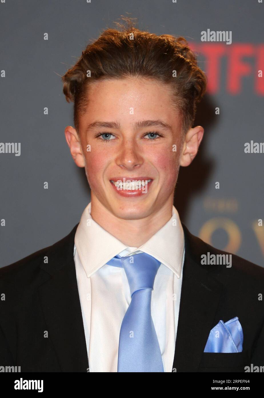 Finn Elliot Attends The World Premiere Of Season 2 Of Netflix The Crown At Odeon Leicester