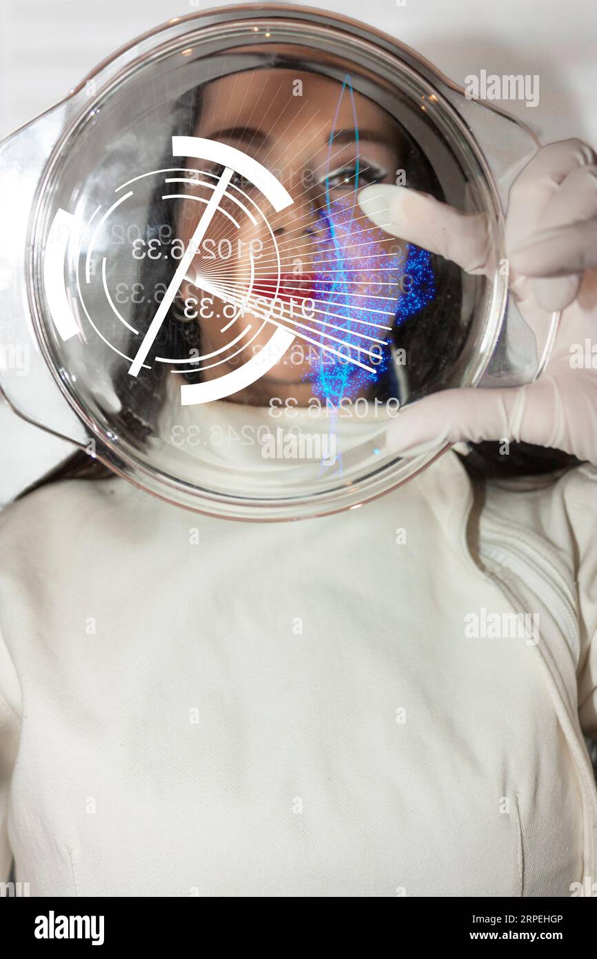 Female scientist investigating chromosomes carrying long DNA fragments ...