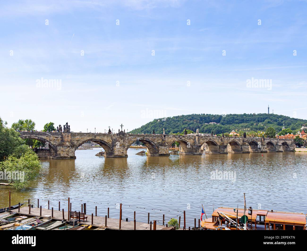 The medieval Charles Bridge over the Vltava River in Prague has 30 ...