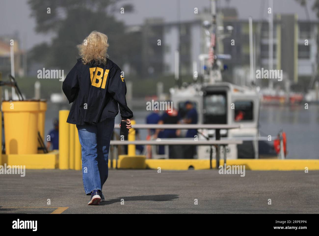 (190902) -- OXNARD (U.S.), Sept. 2, 2019 -- An FBI agent arrives at the ...