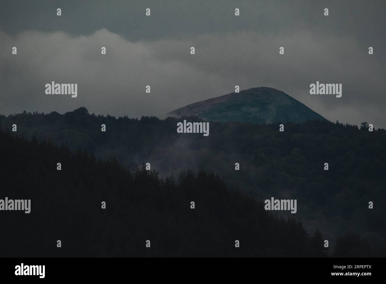 Dark and moody landscape in the mountains Stock Photo - Alamy