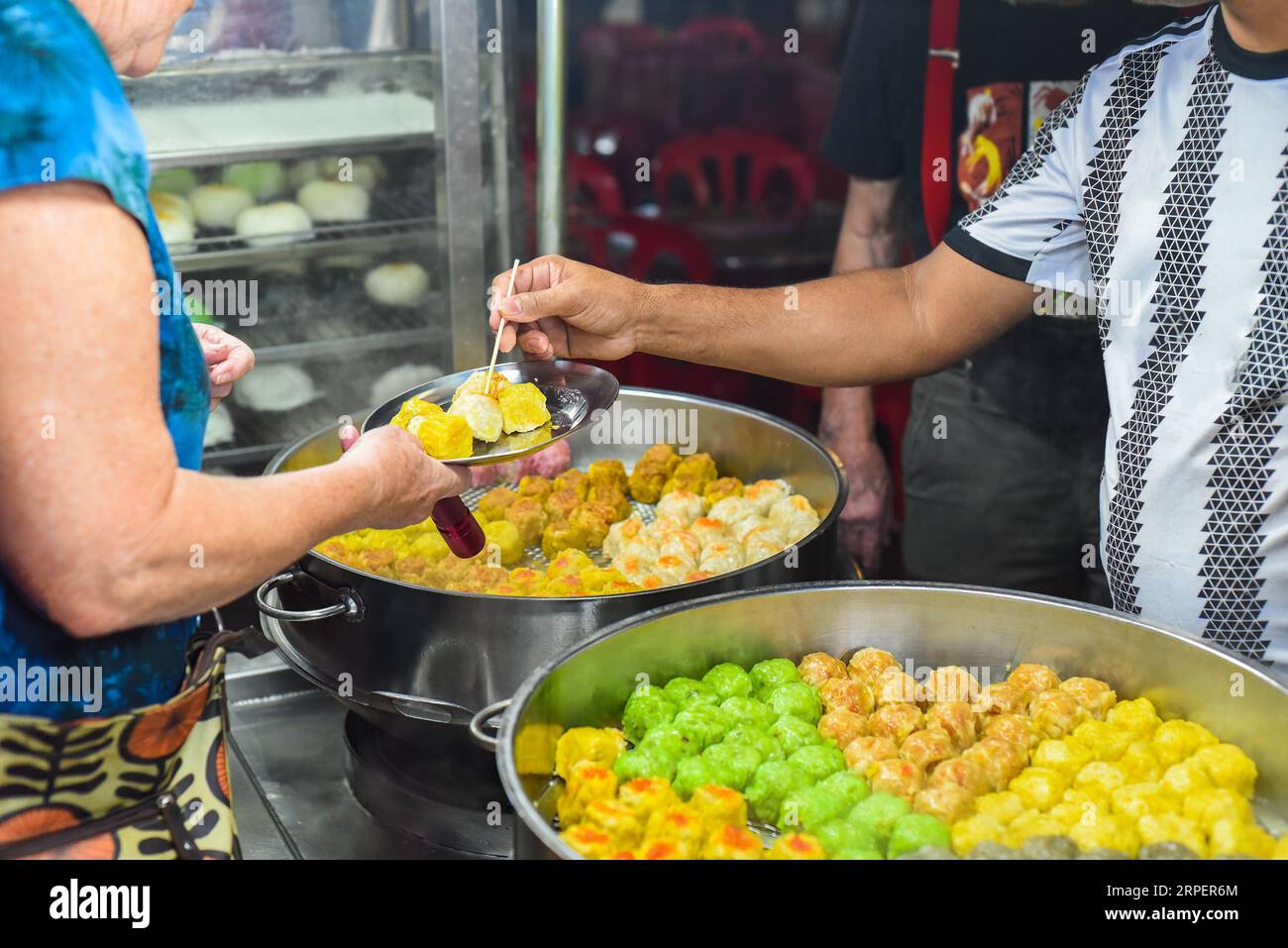 Handmade Dim Sum with different fillings in Jalan Alor street food in ...