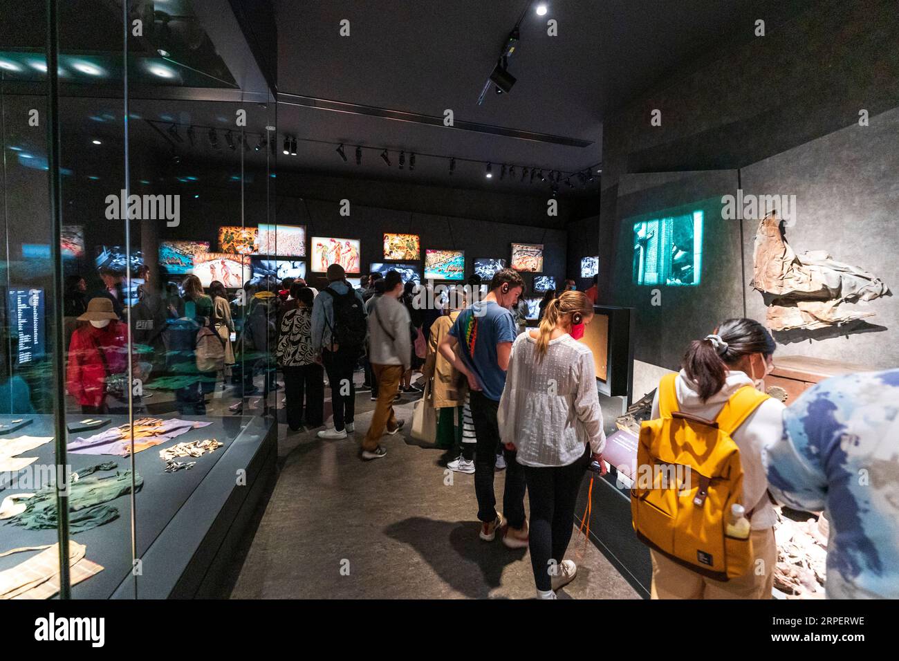 Interior shot, people viewing exhibits in the main exhibition room of ...