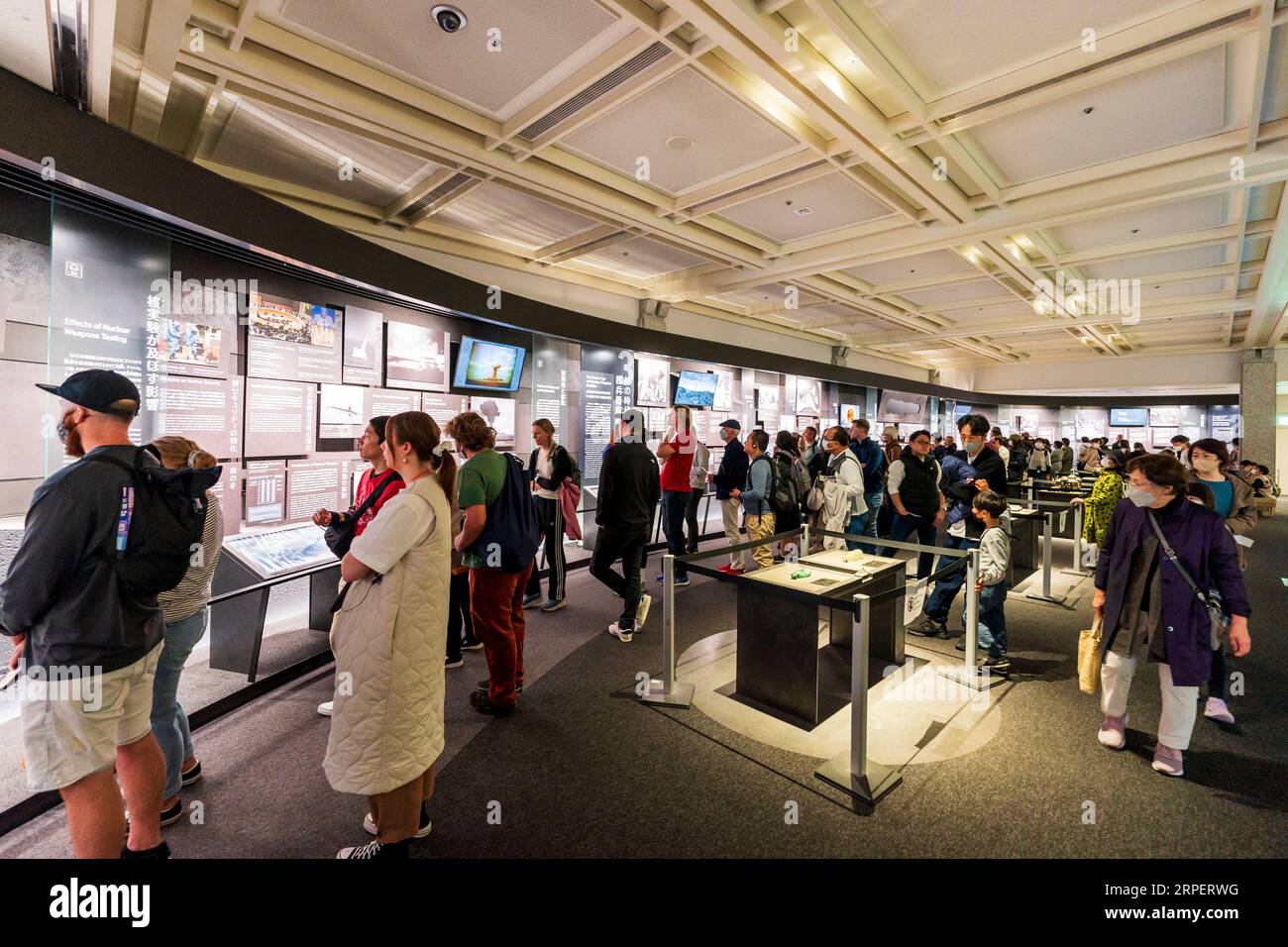 Interior shot, people viewing exhibits in the media table room ...
