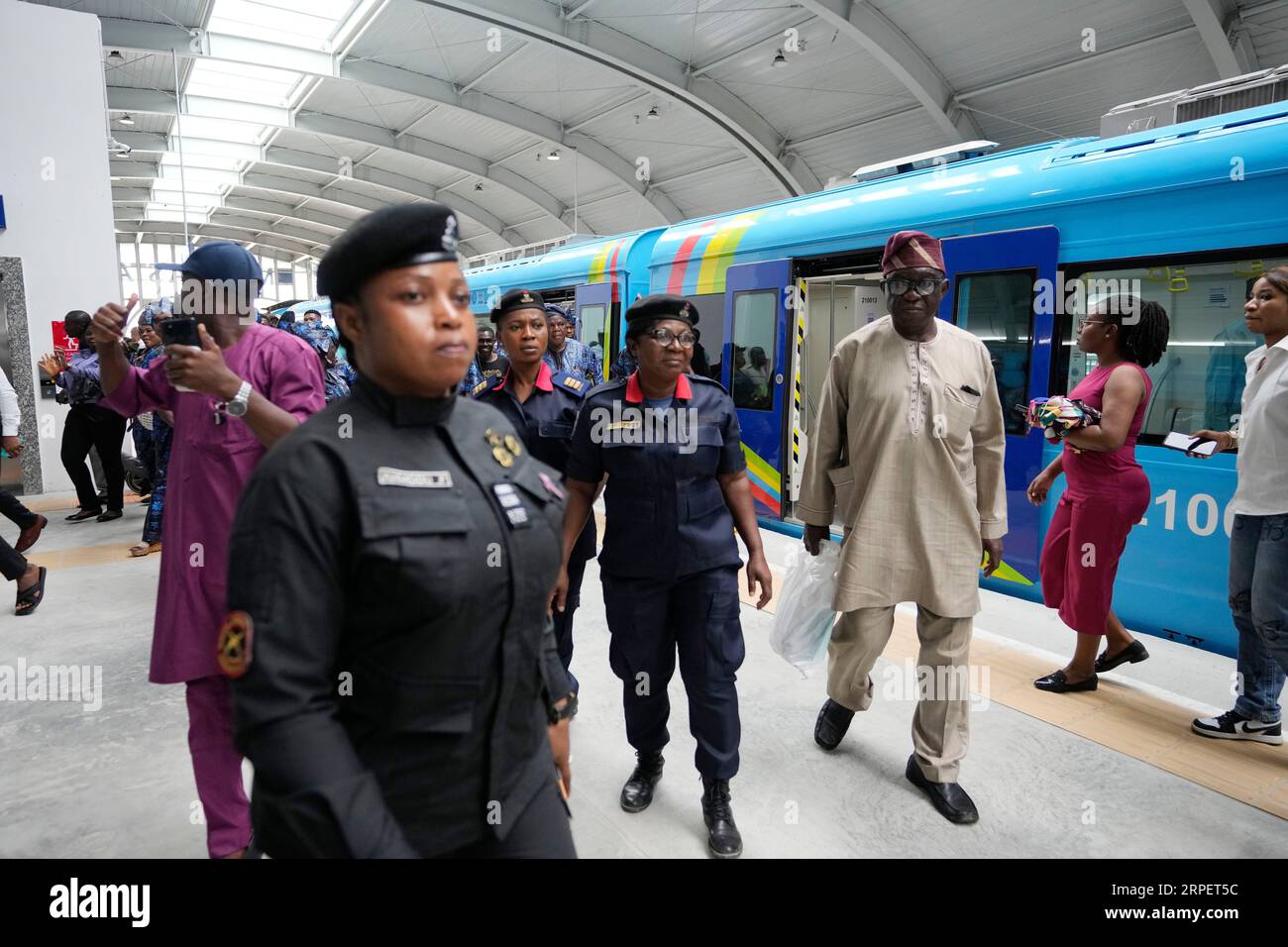 People exit a new Lagos blue line train service in Lagos, Nigeria ...