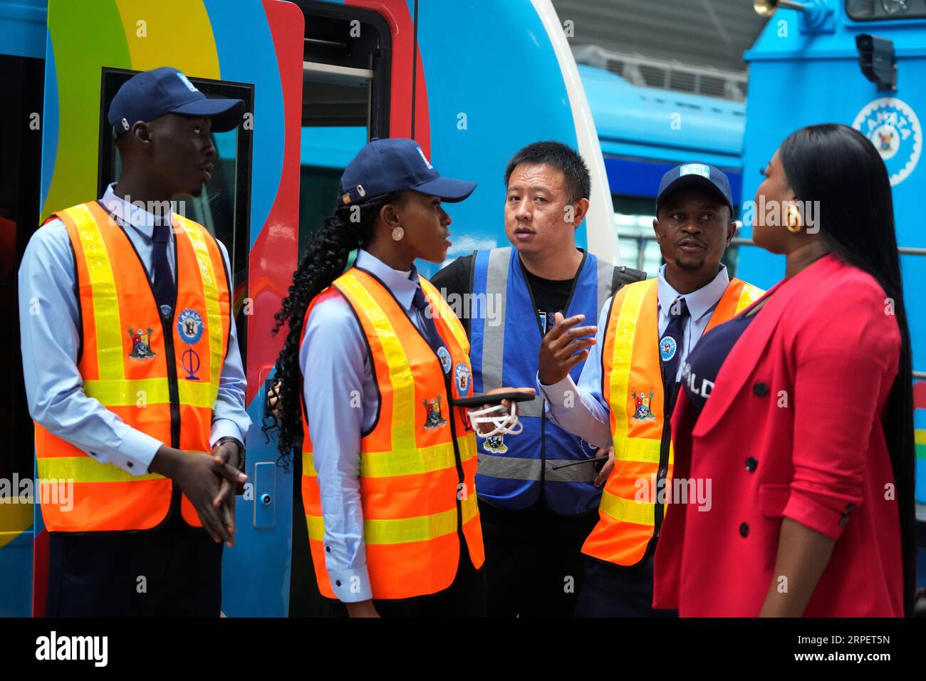 Workers are seen at a new Lagos blue line train in Lagos, Nigeria ...