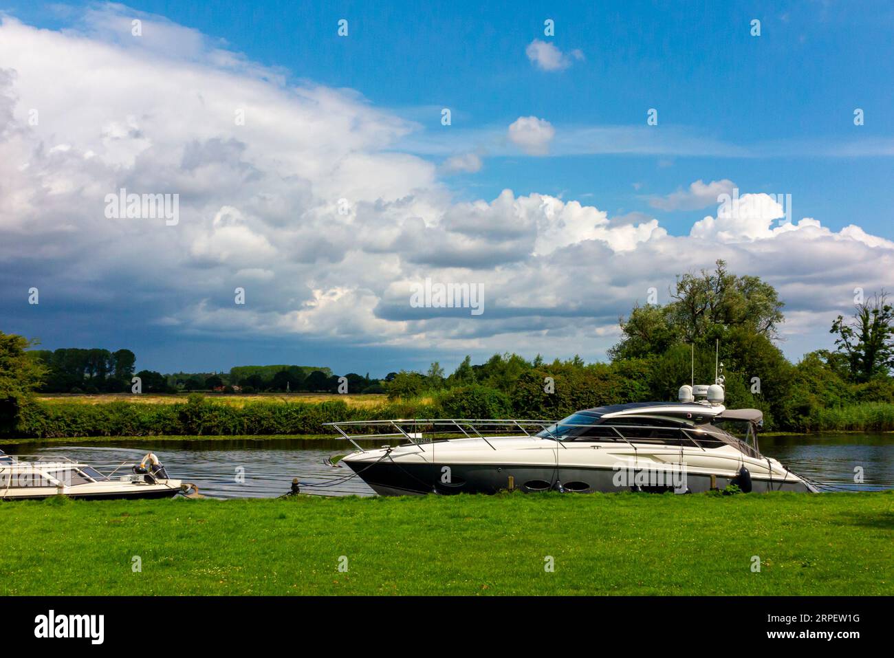 Pleasure boats moored on the River Yare at Bramerton Common in the ...