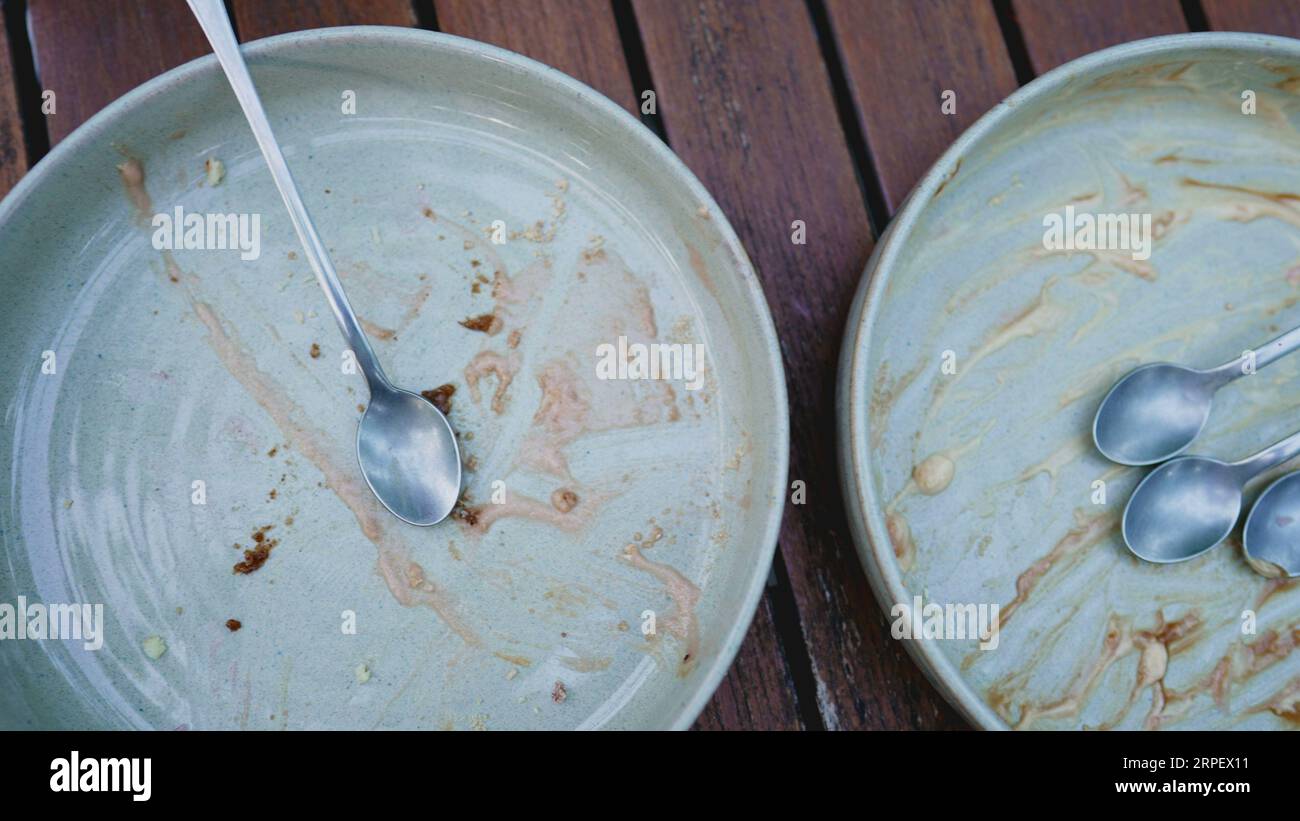 After the Indulgence of Remnants on Plate Post Gourmet Dessert, Spoons ...