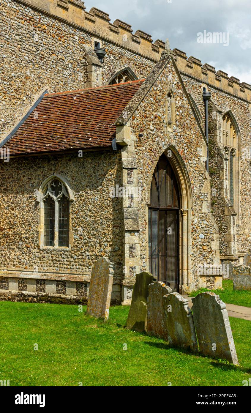 Entrance door and grave stones at Church of St Helen in Ranworth ...
