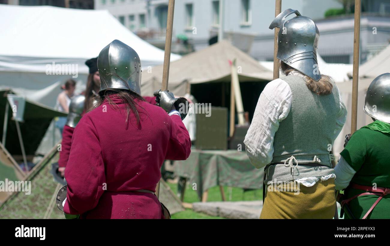 Guardians of the Past, Soldiers Poised with Spears at Reenactment ...