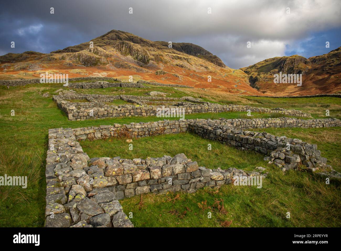 Sun lit walls and autumn colours at Hardknott Roman Fort, just off the ...