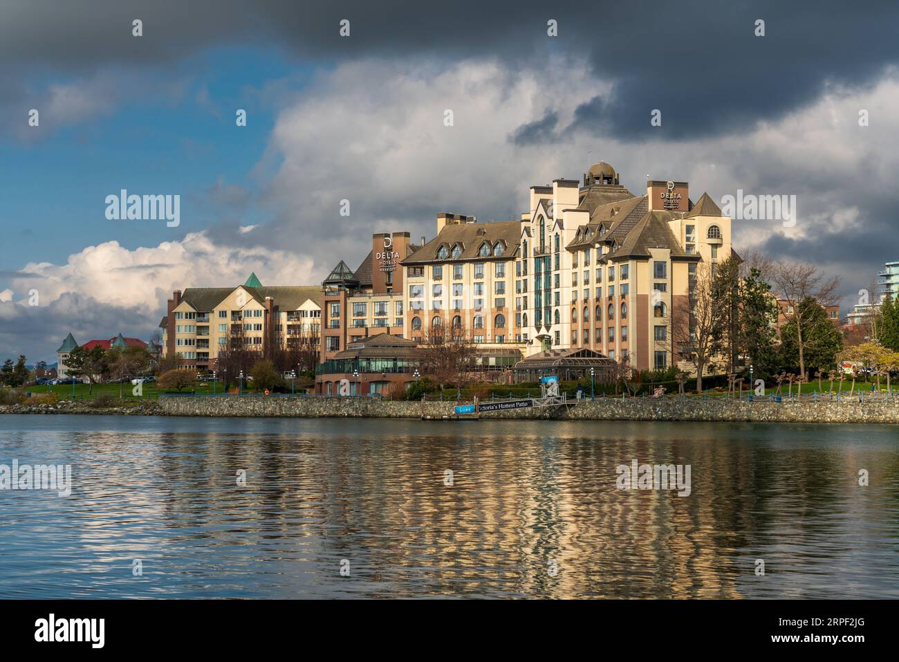 The Delta Marriott Hotel reflected in the water in Victoria, Vancouver ...