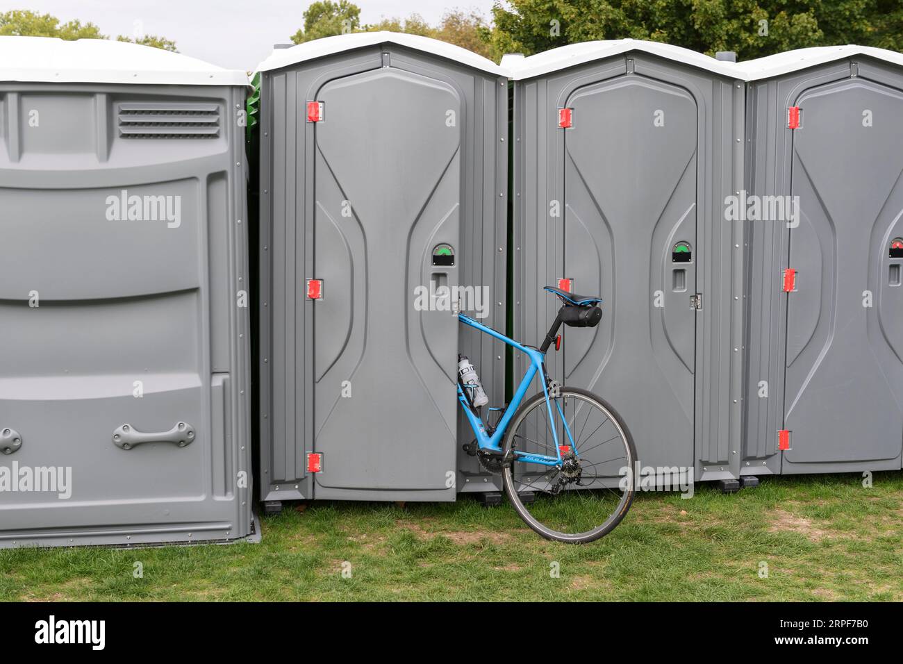 A bicycle sticking out of a portaloo, Hyde Park, London, UK. 19 Sep ...