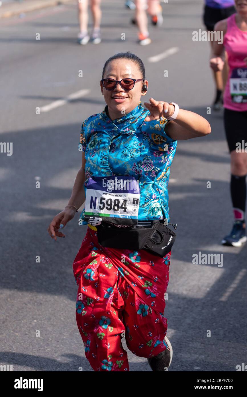 Manisha Limbu competing in The Big Half wearing Nepali Gunyu cholo ...