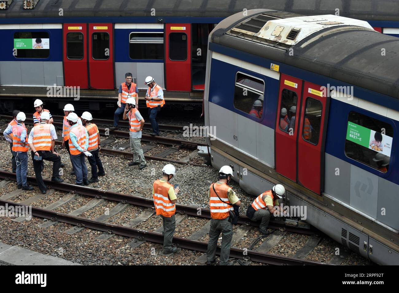190917 -- HONG KONG, Sept. 17, 2019 -- Firefighters and workers of the ...