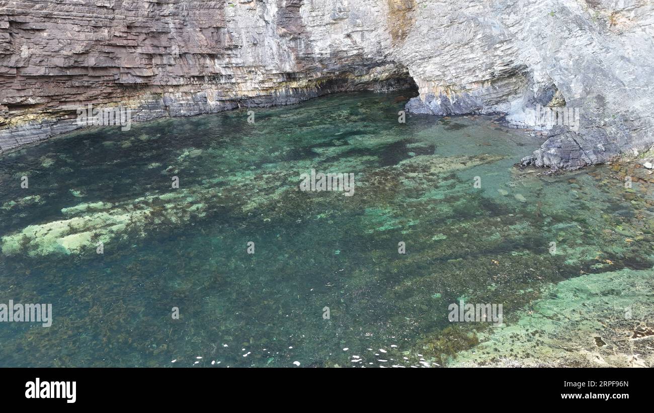 Majestic aerial view of a stunning rocky bay in Caithness, Scotland ...