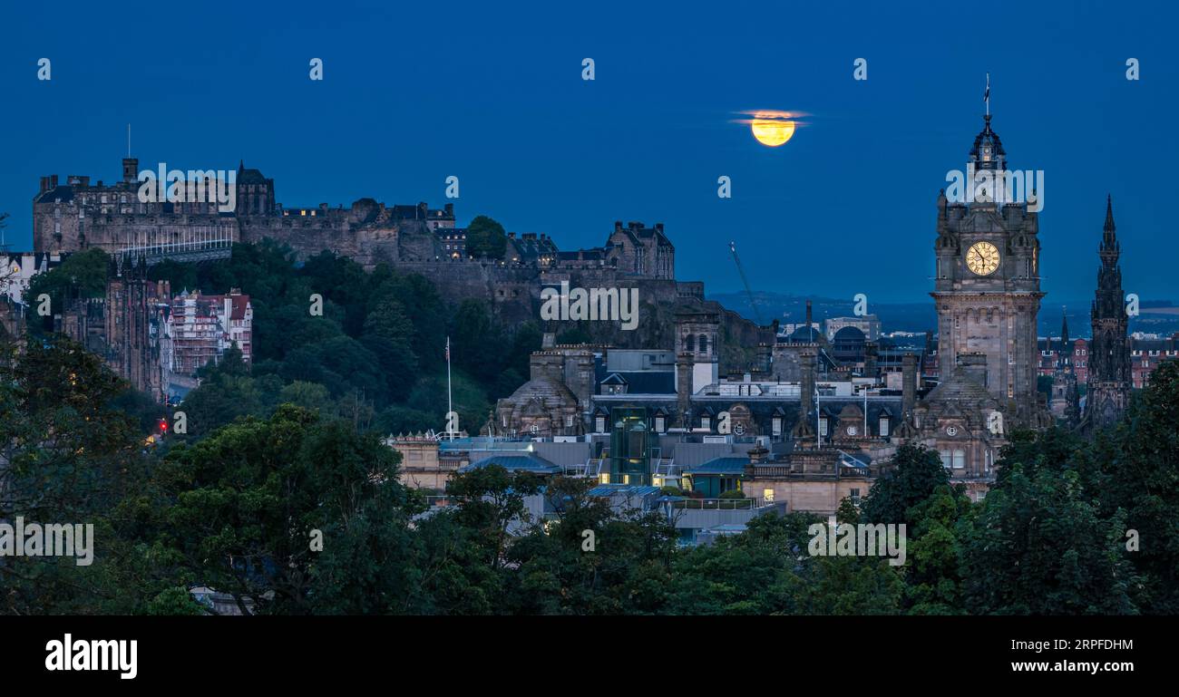 City skyline with full blue supermoon over Balmoral clock tower, Scott ...