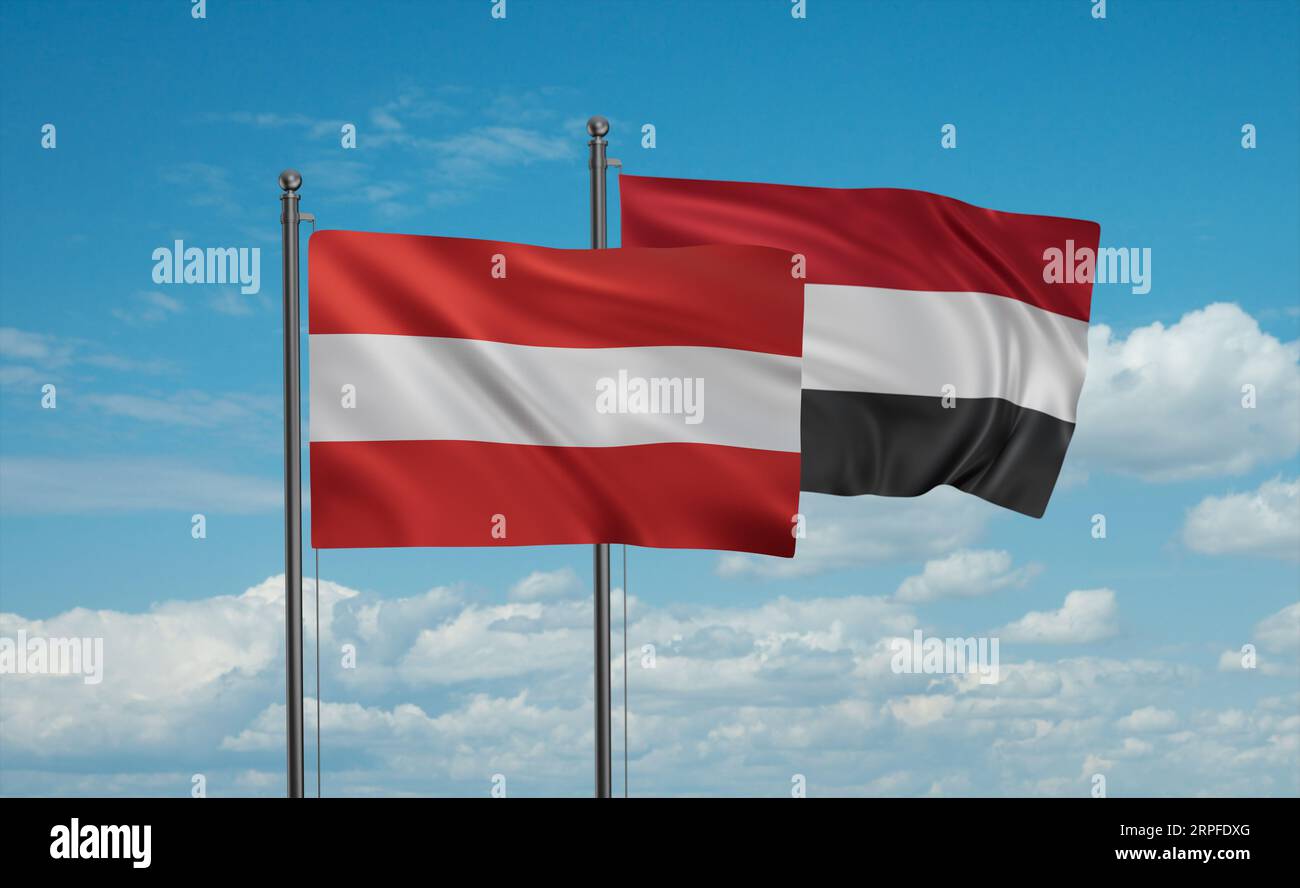 Yemen and Austria flag waving together in the wind on blue sky, two ...