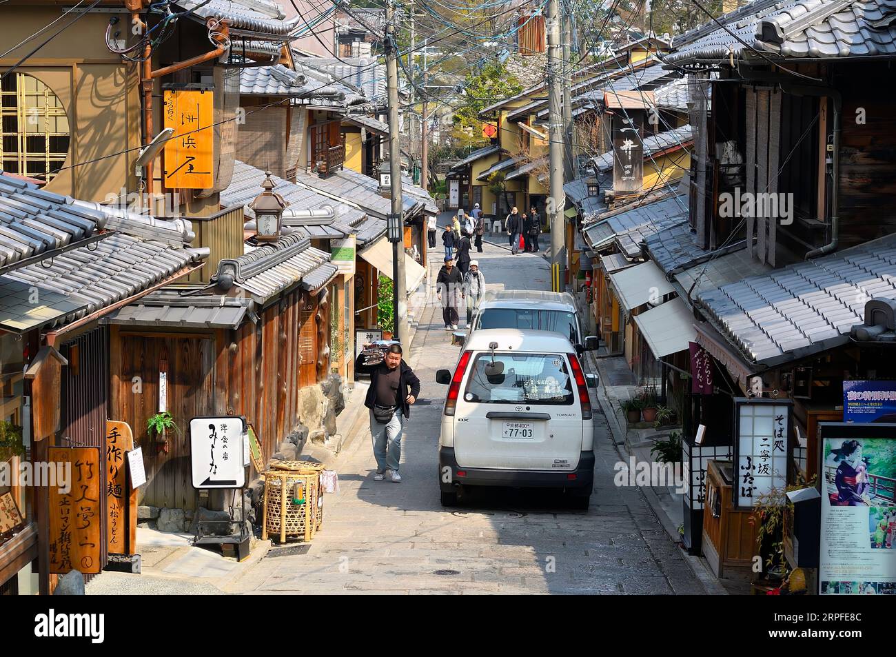 A shopping street at Kiyomizu 3-chome in the old town of Kyoto, Japan ...